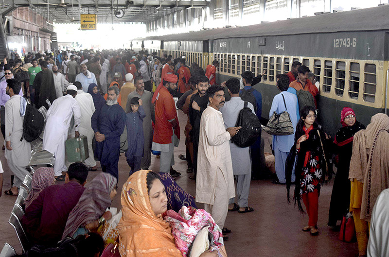Bus, Railway stations bustle as passengers return to cities after Eid ...